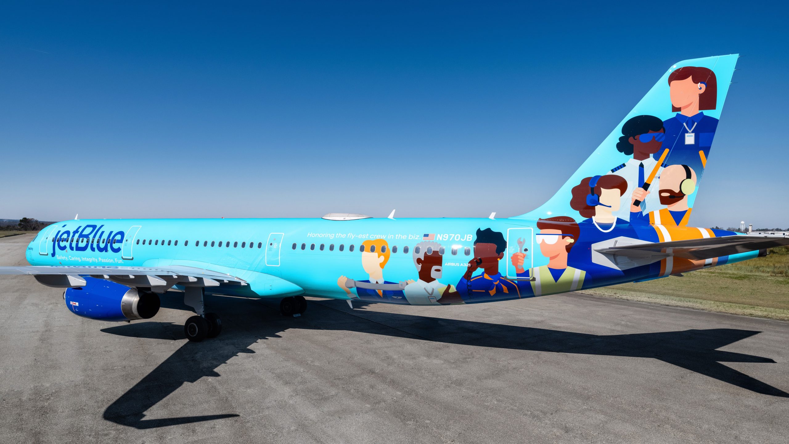 JetBlueは、乗組員に25周年記念のカラーリングを捧げます - 「アスナのトラベルスタジオ」